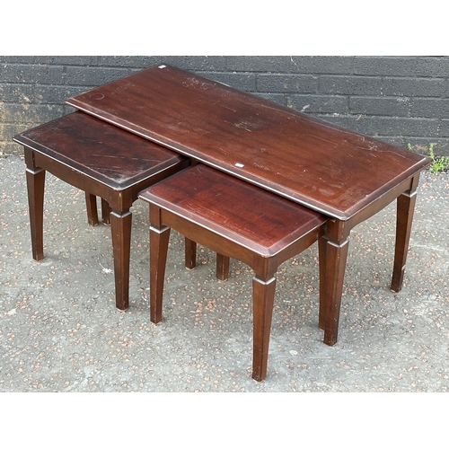 A Stag mahogany coffee table and 2 nesting tables.