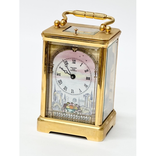 Halcyon Days Enamels. A brass cased carriage clock, with enamel dial ...