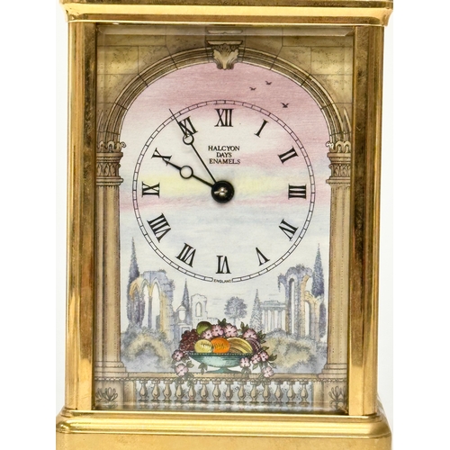Halcyon Days Enamels. A brass cased carriage clock, with enamel dial ...