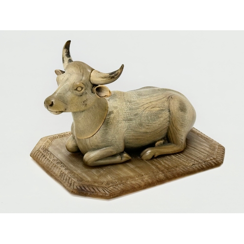 A fine quality 19th Century carved wooden Nandi on horn base. Probably ...