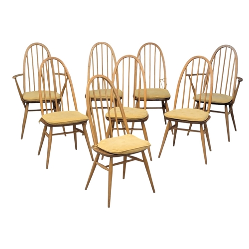 A set of 8 Ercol Mid Century Blonde elm and beech dining chairs. Model 365a