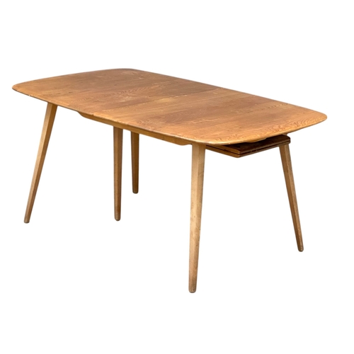 The Ercol Grand Windsor Table. A Mid Century blonde elm and beech ...