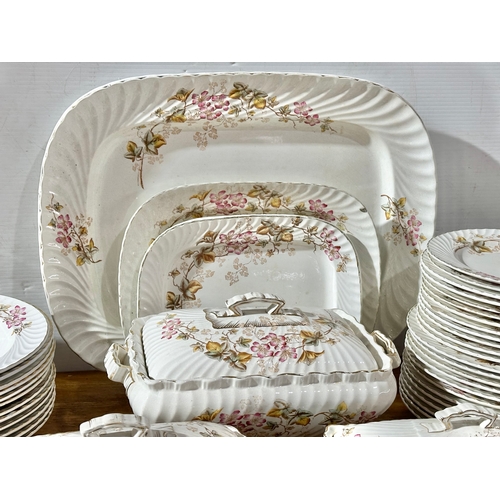 A large late 19th century opaque china dinner service. 12 dinner plates ...