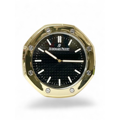 An AP Audemars Piguet advertising wall clock. 34cm