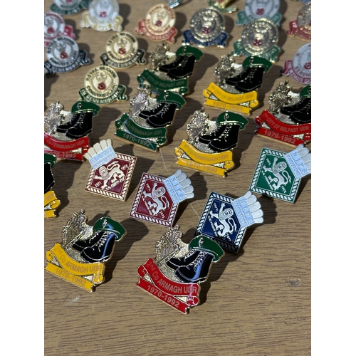 A collection of badges. UDR, Prison related etc.
