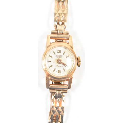 A vintage gold Cornavin wrist watch. The watch having a round face with ...