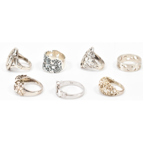 A collection of 925 silver punched design dress rings. The lot to ...