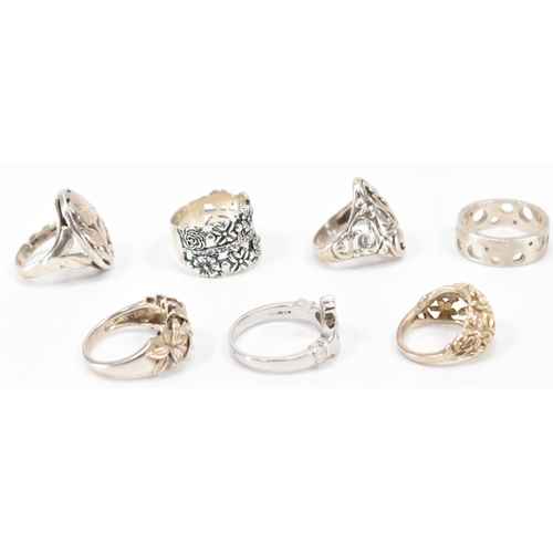 A collection of 925 silver punched design dress rings. The lot to ...