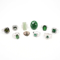 A collection of 925 silver & green stone set dress rings. The lot to ...
