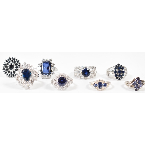 A collection of 925 silver & blue stone set rings. The lot to include ...