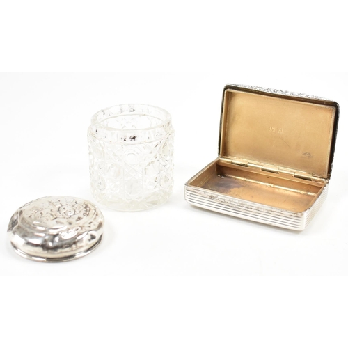 A silver hallmarked pill pot having empty cartouche to centre with ...