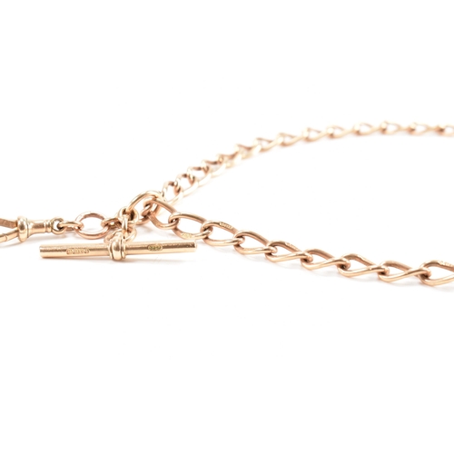A hallmarked 9ct gold watch chain necklace. The chain having two swivel ...