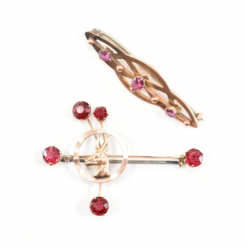 Two gold brooches. The lot to include a vintage South African springbok ...