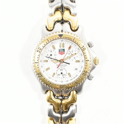 A Tag Heuer two tone Professional stainless steel wrist watch. The ...
