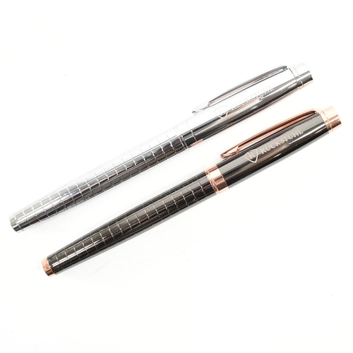 A pair of Ruckstuhl stainless steel ball point lidded pens in gift ...