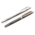 A pair of Ruckstuhl stainless steel ball point lidded pens in gift ...
