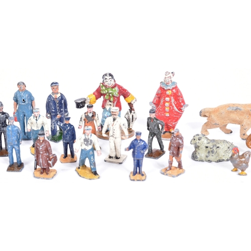 A collection of vintage lead / hollow cast figures to include to ...