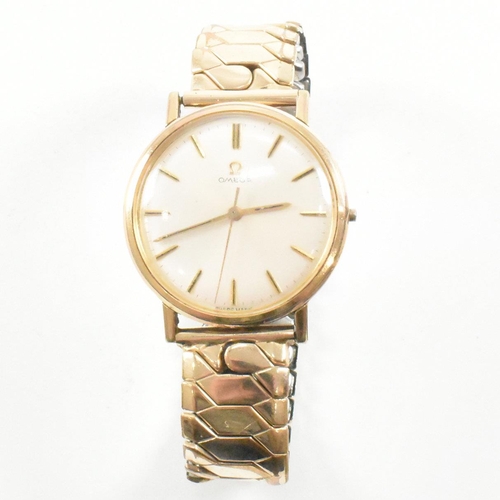 A vintage Omega gold tone wristwatch. The watch having a circular ...