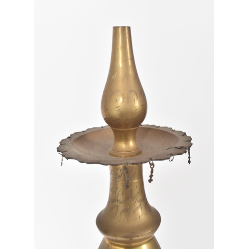 A large vintage 20th century Middle Eastern brass hookah pipe. The pipe ...
