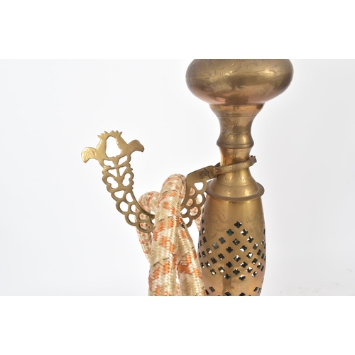 A large vintage 20th century Middle Eastern brass hookah pipe. The pipe ...