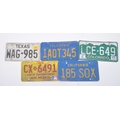 A mixed selection of vintage American car number plates. The plates of ...
