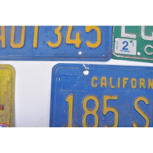 A mixed selection of vintage American car number plates. The plates of ...