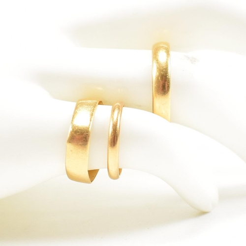 Three hallmarked 22ct gold band rings. Two hallmarked Birmingham one ...