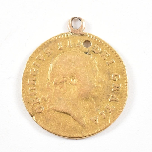 A George III (1760-1820) gold halfÿ guinea coin dated 1804.ÿRoyal Mint ...