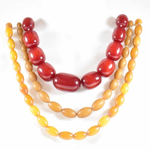 A cherry amber Bakelite and early plastic necklaces.ÿ Measures cherry ...