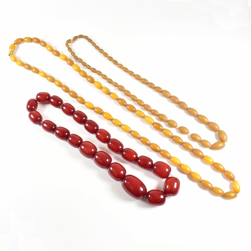 A cherry amber Bakelite and early plastic necklaces.ÿ Measures cherry ...
