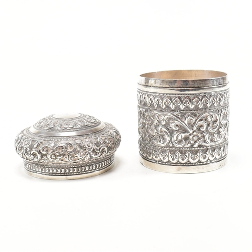 An early 20th century Indian white metal cannister. The lidded jar ...