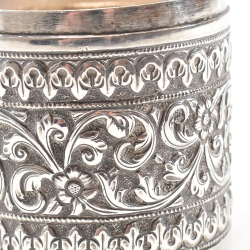 An early 20th century Indian white metal cannister. The lidded jar ...