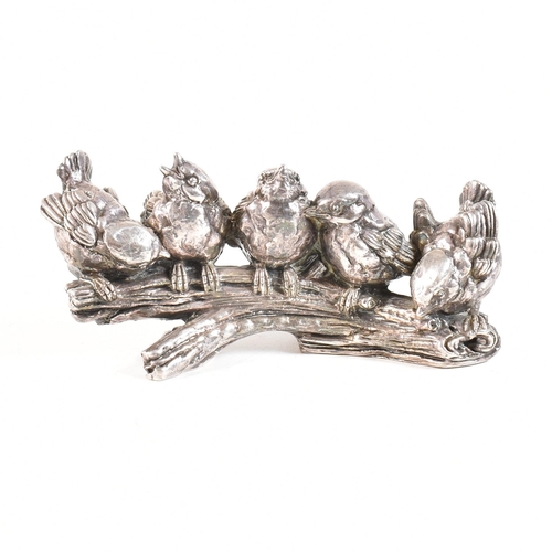 A 925 silver mounted model of five birds perched on a log along with a ...