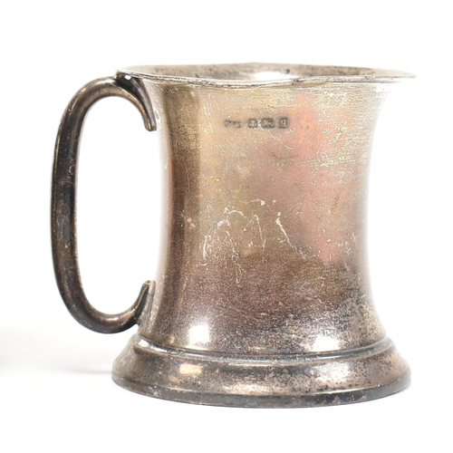 Two Early 20th century hallmarked silver tankards. The larger tankard ...