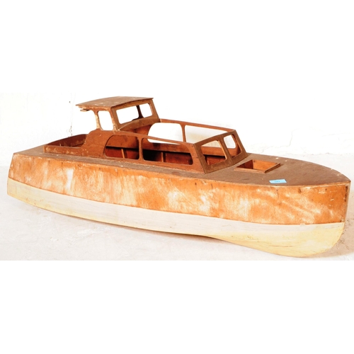 A 20th century stripped balsa wood model of a motor boat. The model ...