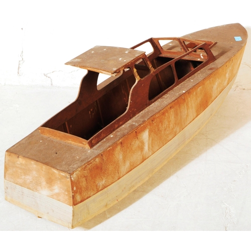 A 20th century stripped balsa wood model of a motor boat. The model ...
