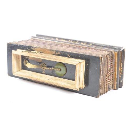 A 19th century inlaid Flutina accordion squeeze box. The flutina ...