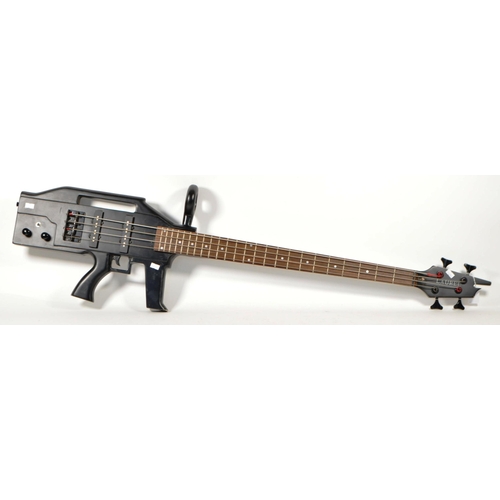 Contemporary late 20th / 21st century laurel machine gun bass guitar ...