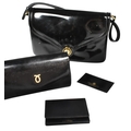 A collection of Launer London handbags and wallets. The lot toinclude a ...