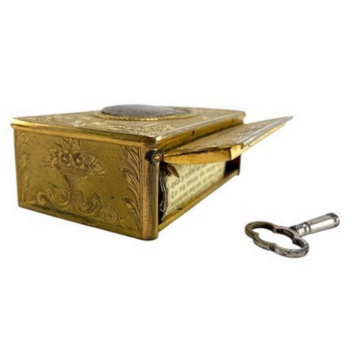 A circa 1900 Continental gilt brass musical automata box. With an ...
